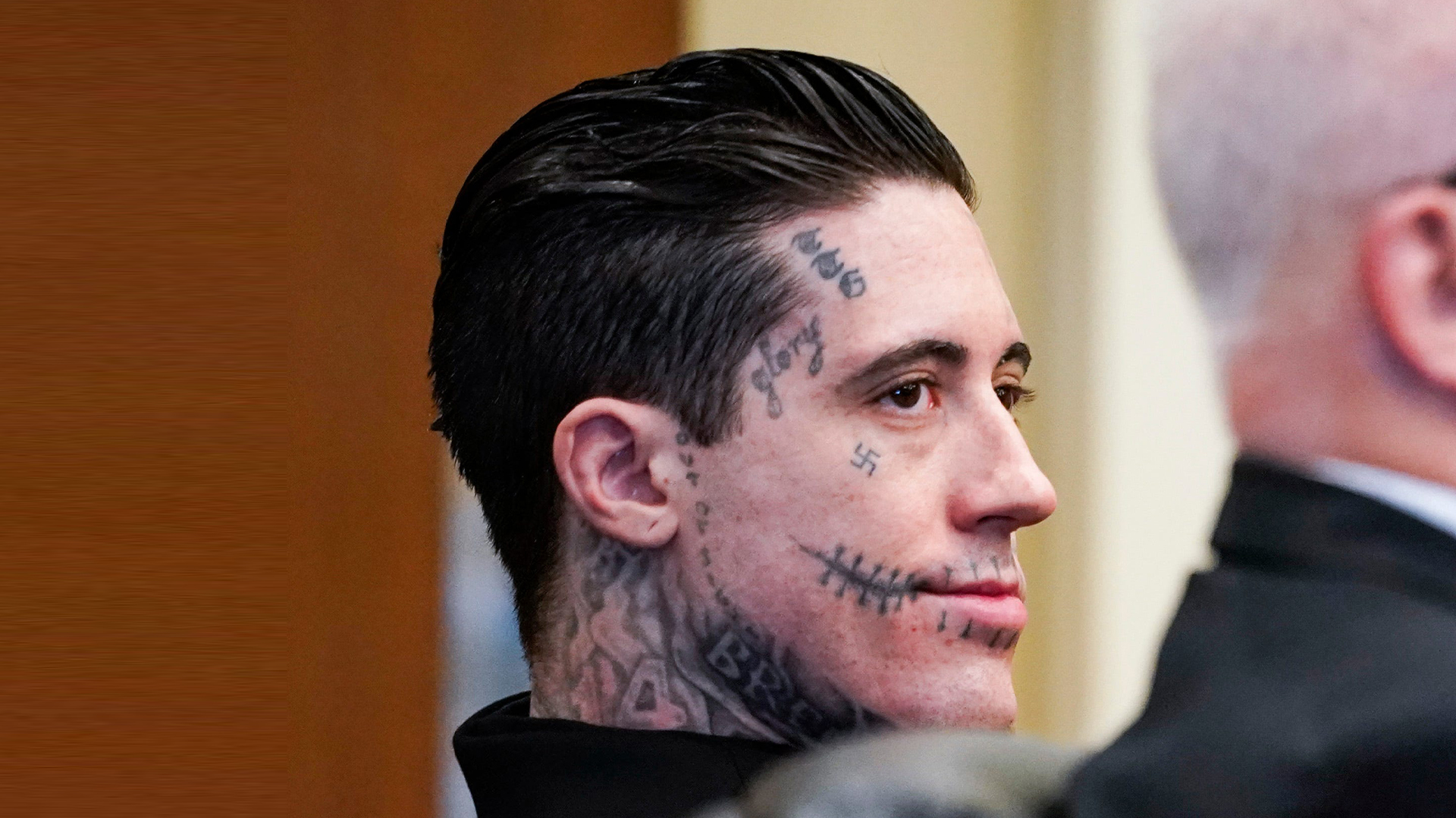 Wade Wilson smirks at the judge as double-murderer with face tattoos ... Wade Wilson smirks at the judge as double-murderer with face tattoos ...