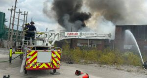 Firefighters confront blaze with gunfire at metal recycling plant ...